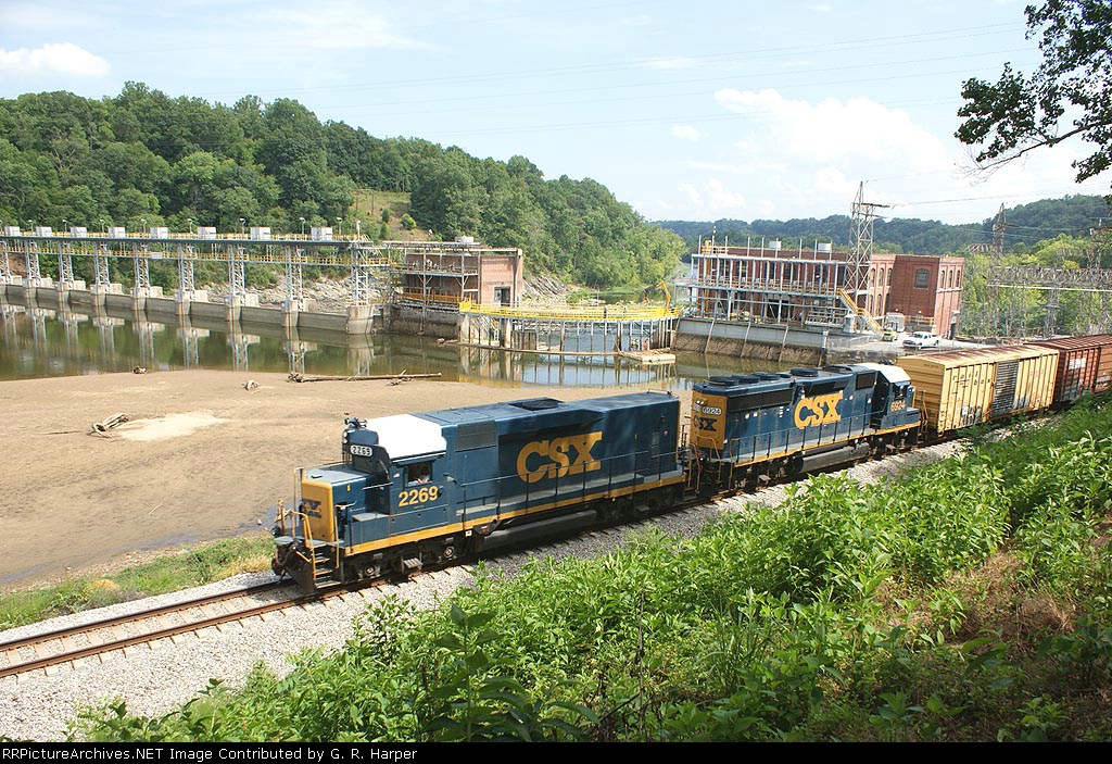 Slug and mom on the H743 head west past Reusens Dam with lowered pond